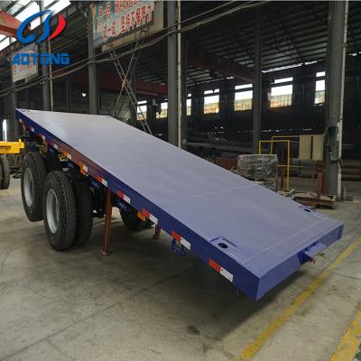 China 40FT Flatbed Container Trailer with 3 Axles and Air Suspension for sale
