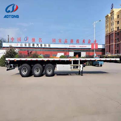 China 3 Axle 20FT 40 Ton Container Flatbed Trailer with Twist Lock for sale