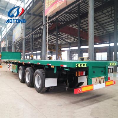 China 3 Axles Flatbed Container Semi Trailer with Q345B Carbon Steel Main Beam and 500mm High Main Beam for Heavy Duty Transport for sale
