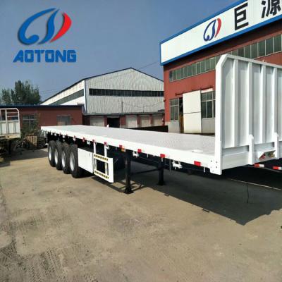 China Heavy Duty 2/3/4 Axles 40-80FT Flatbed Semi Trailer with 13T Axle Weight Load for Container Transport for sale