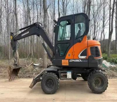 Cina Escavatore a ruote Doosan DX60W di proprietà preliminare Larghezza totale del trasporto 2000 mm in vendita
