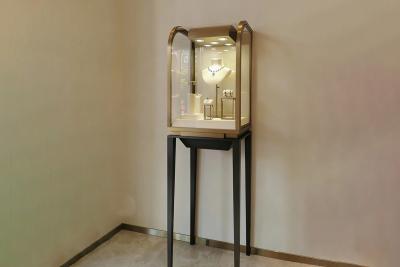 China CustomizedJewelry Display Cabinet Curved Bronze Frame  Jewelry Display Stands For Retail for sale