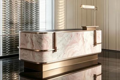 China Luxury Pink Onyx Marble Reception Desk with Bronze Metal Trim and Curved Design for Salon Front Counter for sale