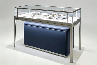 China Light Luxury Rounded Edge Glass Jewelry Display Counter With Storage Cabinet 1200*550*950mm for sale