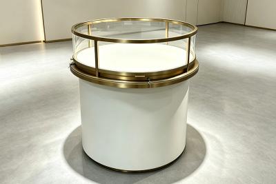 China Round Jewelry Island Showcase with Brushed Gold Frame, 360-Degree Viewing and Integrated LED Lighting for sale