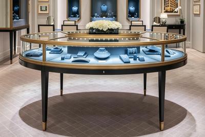 China High-End Oval Jewelry Island Showcase with Curved Tempered-Glass and LED Accent Lighting Featuring Lockable Drawer for sale