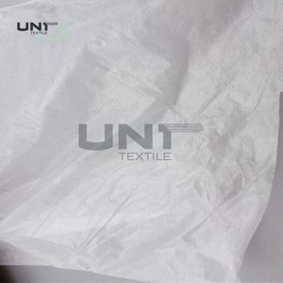 China Mesh Point Film Fusing Interlining Adhesive Non Woven Rolls 0.9 - 180cm For Bonding Shirt for sale