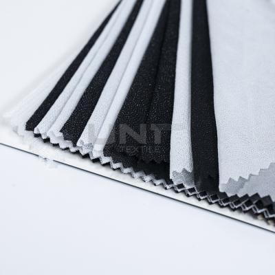 thin Fabric Fusible Woven 숙녀의 행간에 어구를 삽입 수축량 저항하는 검정 PA 코팅