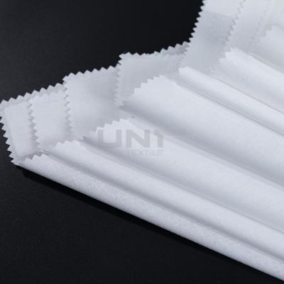 중국 저항하는 100%년 폴리에스테를 행간에 어구를 삽입하는 자연적인 연약한 셔츠 Shringkage 판매용