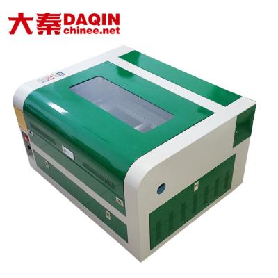 중국 Daqin 9h Anti Shock Screen Protector Cutter 40*60cm Working Area For Pet Tempered Glass 판매용