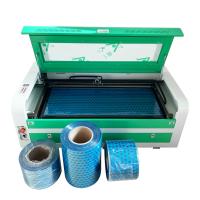 China DAQIN 6040 4060 CO2 Screen Guard Cutting Machine for sale