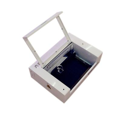 China High Cutting Accuracy and 25*36 CM Cutting Area Laser Cutting System for Screen Protector for sale