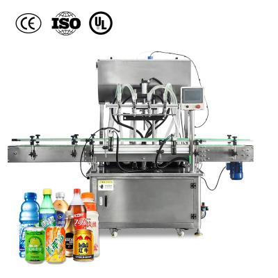 China 4 Nozzle Gear Pump Fillers Food Grade Liquid Filler Machine 3500W for sale