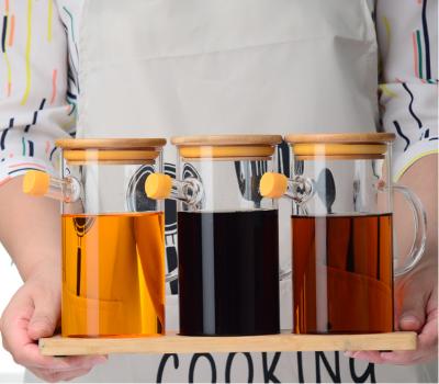 Cina Bottiglia della salsa delle scatole metalliche del vetro trasparente di iso della prova della perdita con il coperchio di bambù in vendita