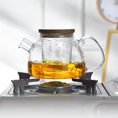 Cina Bollitore per tè in vetro borosilicato alto da 550 ml 800 ml con coperchio in bambù con infusore in vetro in vendita
