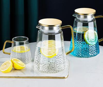 Cina la caraffa del vetro borosilicato di 1500ml 420ml ha messo di 9 con il coperchio del filtro degli ss in vendita