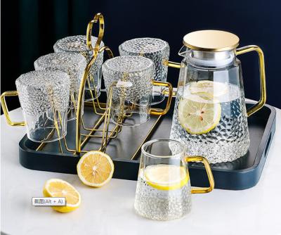 Cina la caraffa del vetro borosilicato di 1500ml 420ml ha messo di 9 con il coperchio del filtro degli ss in vendita