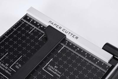 Cina ZEQUAN A4 tagliatrice di carta a ghigliottina mini trimmer manuale per la triturazione della carta da ufficio in vendita