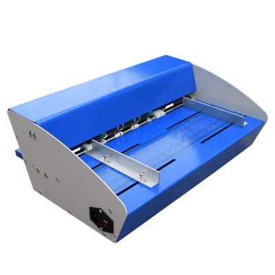 Cina A3 Macchina elettrica per la perforazione della carta con peso di 12 kg e tensione 220/110V 50HZ in vendita
