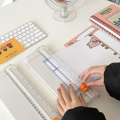 Cina ZEQUAN Mini A5 Tagliatore di carta fotografica per bambini Aiutante artigianale con righello e tagliabagno in vendita
