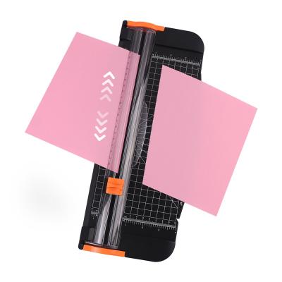 China 12 folhas de papel A4 Mini Cutter com tamanho de corte de 330x320mm e tecnologia de corte à venda