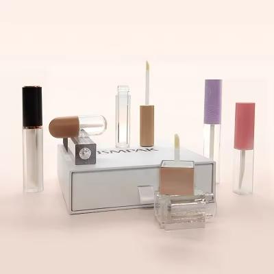 China Empty Big Brush Lip Tint Bottle Customized Logo Free Samples Lip Gloss Containers for sale