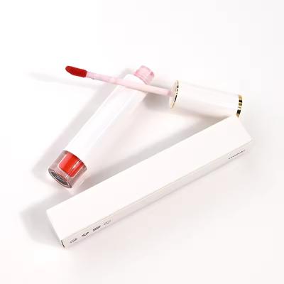 China Envases de tubos de brillo para labios redondos, transparentes, envases de tubos cosméticos vacíos en venta