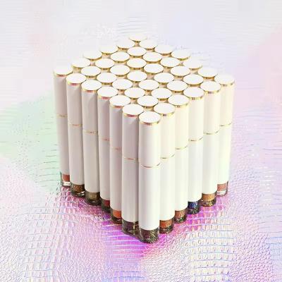 China Envases de tubos de brillo para labios redondos, transparentes, envases de tubos cosméticos vacíos en venta