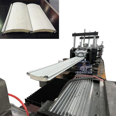 PU sandwich shutter door roll forming machine for Turkey Galvanized steel or PPGI or Aluminium