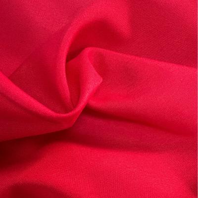 Cina 113gsm75D * 150D impermeabile spazzolato Twill Peach Skin Velvet Pantaloni da spiaggia rossi Tessuto in vendita