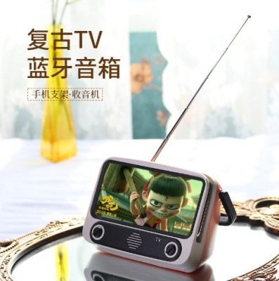 China New retro bluetooth speaker mobile TV holder desktop bluetooth speaker TF card FM radio for sale