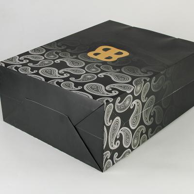 中国 贅沢で有名なブランドのギフトの習慣はあなた自身のロゴの買物をする紙袋を印刷した 販売のため