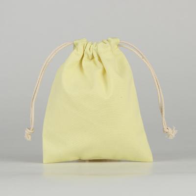Cina Borsa di cordone promozionale della mussola di Eco di colore del limone del sacchetto organico amichevole del cotone piccola in vendita