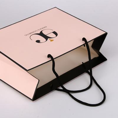China Bolsas de papel de encargo de las compras de la impresión con su propio logotipo en venta