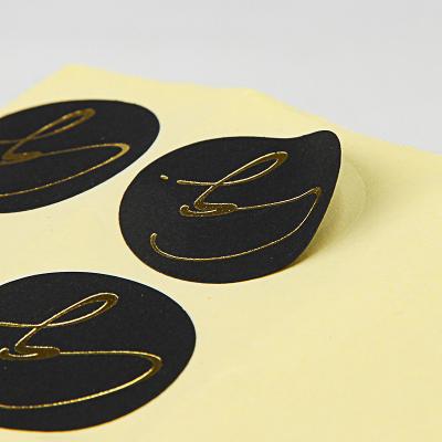 Cina Giro nero Matte Black Paper Sticker Labels con il logo dell'oro in vendita