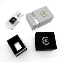 China Custom Silver Foil Logo Texture Black Paper Gift Perfume Box Packaging for sale