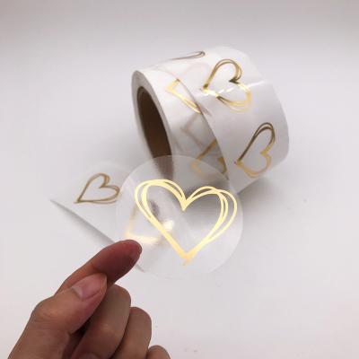 China 38mm Round Plastic Clear Glossy Sticker Paper Waterproof Labels for sale
