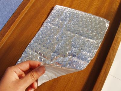 China Reflective aluminum foil double layer bubble window heat insulation wrap for sale