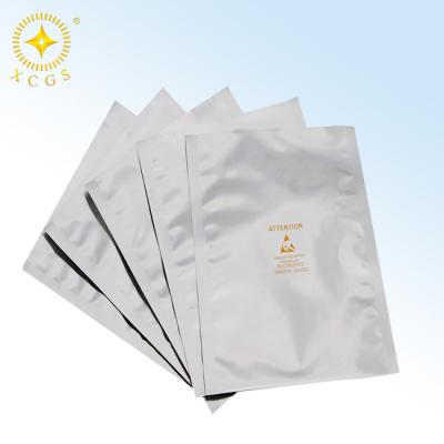 China Yellow printing silver white aluminum foil vacuum printing foil bags with two sealings for sale