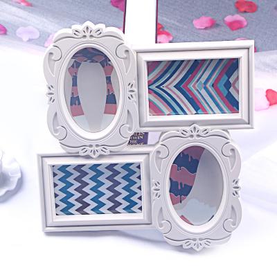 China Chinese Manufacturer hot sale 4 openings white ps irregular carved photo picture frame for sale