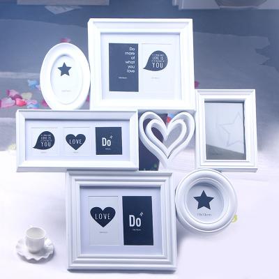 China Chinese Manufacturer  Newest design white 7 opening photo frame funky multi frame for sale