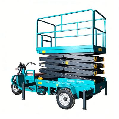 China 500KG Mewp Tricycle Rough Terrain Scissor Lift Mobile Elevated Work Platform for sale