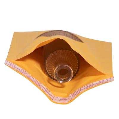 China Biodegradable Kraft Paper Bubble Envelope Honeycomb Padded Mailer Wrap for Shipping Packaging Bag for Socks Shoes Fur for sale