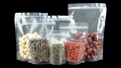 China Glossy Transparent Storage Bag Resealable Clear Zipper Pouches With Tear Notch For Food Packing And Non Food Packing for sale