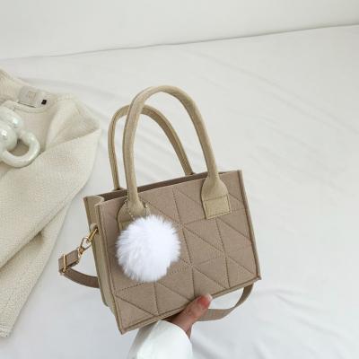 China Bolso de Mensajero en PU de textura 2023 Bolso de mano clásico de hombro cruzado de un hombro Bolso de correa ajustable en venta