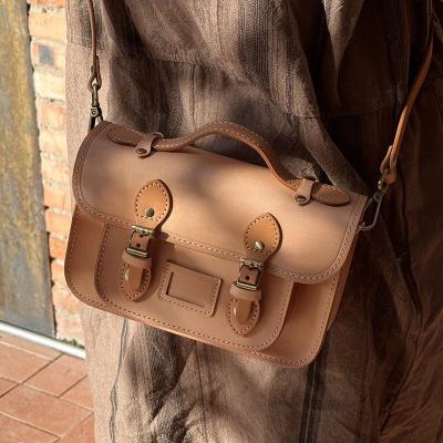 Cina Retro First-Layer Vegetable Tanned Cowhide One-Shoulder Crossbody Bag per la vita quotidiana in vendita
