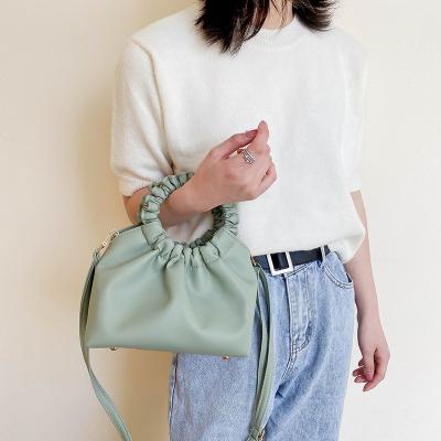 中国 女性用防水携帯電話バケットバッグ プレートデザインとPU革 販売のため