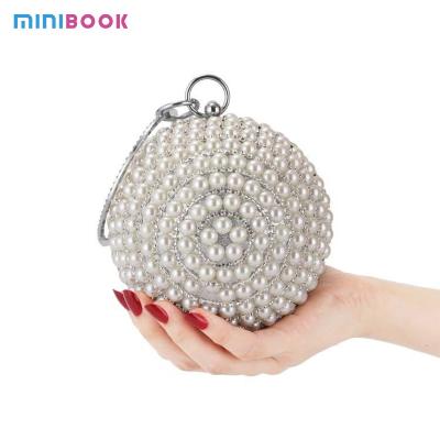 Cina Minibook borsa da mano da donna con materiale principale in metallo e altro tipo di disegno in vendita
