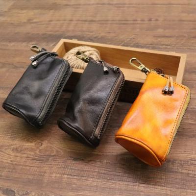 China Chaveira de couro de vaca Vintage Moeda de bolsa para mulheres Homens Vantagem-Low MOQ Mix Modelos à venda