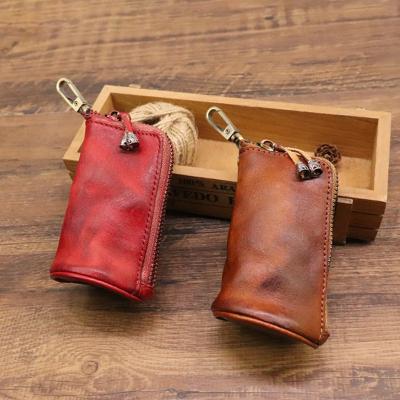 China Chaveira de couro de vaca Vintage Moeda de bolsa para mulheres Homens Vantagem-Low MOQ Mix Modelos à venda